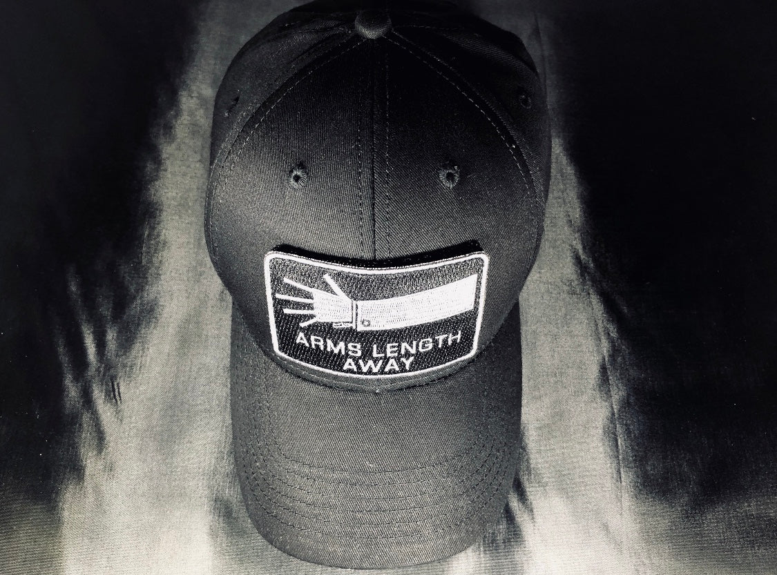 Caps – Arms Length Away